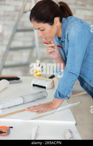 hammer chisel blueprints Stock Photo - Alamy