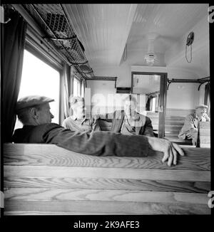 Train travelers in, state railways, SJ freight wagon, 3rd grade Stock ...