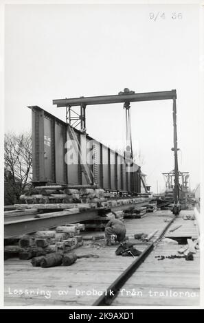 Unloading of bridge beam Stock Photo - Alamy