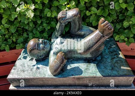 At Vigelandsanlegget a bronze sculpture shows a baby standing on his ...