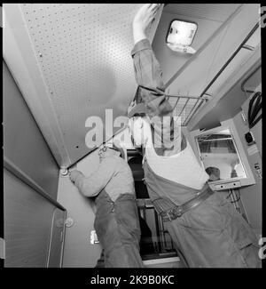 Mounting work in sleeping compartment Stock Photo - Alamy