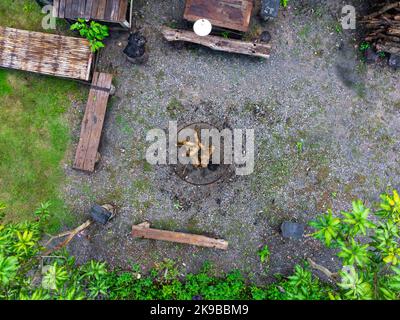 Top view from drone of campground and campfires for rural tourism ...