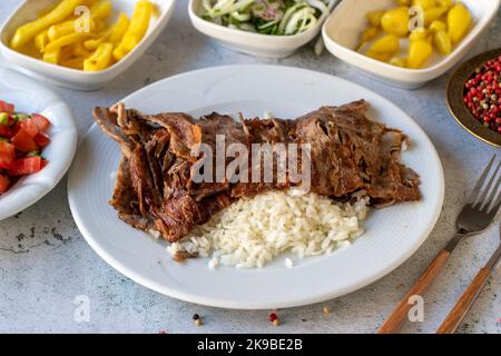 Meat doner with rice on gray background. Traditional flavors. Doner ...