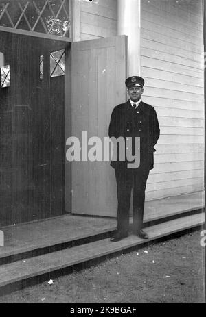 Exhibition man at the entrances Stock Photo - Alamy