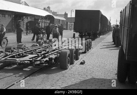 Freight wagon is loaded on carriage Stock Photo - Alamy