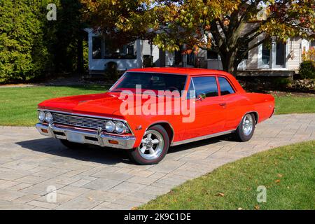 1966 Chevrolet Chevelle 300 Deluxe golden. Front View. Exhibition of ...