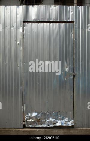 Crumpled metal. Broken door. Steel profile broken. Damaged wall Stock ...