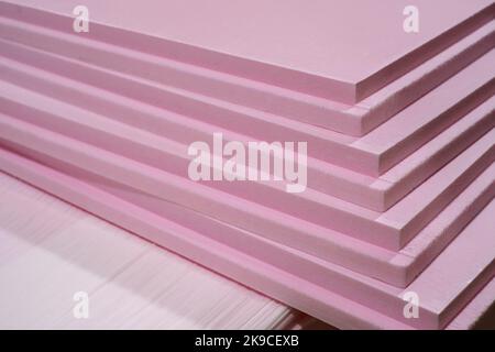 Pink Extruded Polystyrene XPS foam thermal insulation boards stacked in ...