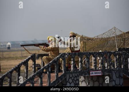 SRINAGAR, INDIA - OCTOBER 27: Indian Army soldiers perform the re ...