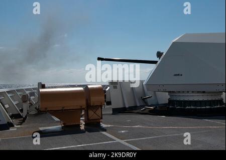The 57mm Mk 110 gun mount onboard the USCGC Hamilton (WMSL 753) fires ...