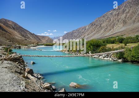 Colorful scenic landscape view of the Gunt river valley with turquoise ...