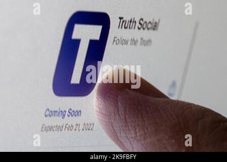 Truth Social app logo seen on the smartphone with blurred Facebook logo ...