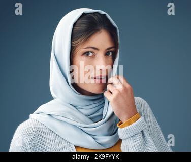 Modern modesty. Cropped portrait of an attractive young woman posing ...