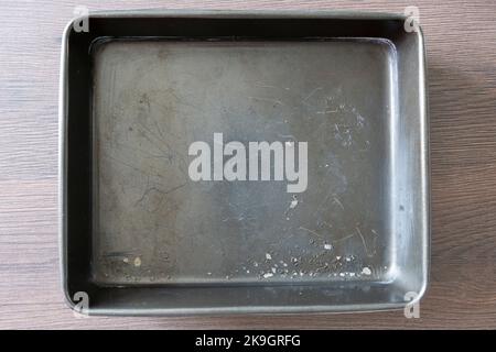 Chipped teflon PTFE (polytetrafluoroethylene) non stick coating on a ...