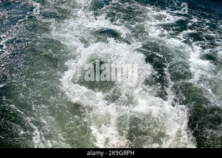 A powerful waves shot from a fast moving boat Stock Photo - Alamy
