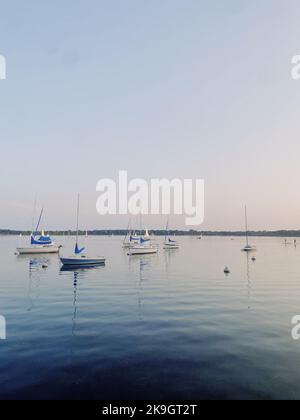 Sailboats on Lake Bde Maka Ska (was Lake Calhoun) with a backdrop of ...