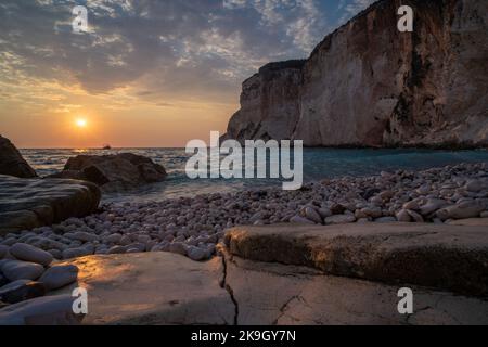 Sunset view from Erimitis Bay Beach (Paxos), Greece Stock Photo - Alamy