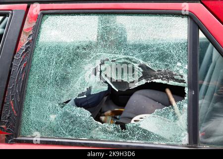 Car with broken windows. A criminal incident. Broken glass window car ...
