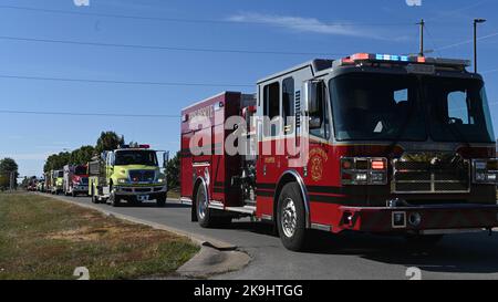 Fire trucks belonging to the Whiteman Air Force Base Fire Department ...