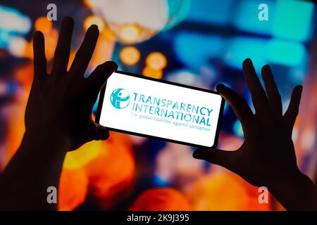 In this photo illustration, the Transparency International logo is ...