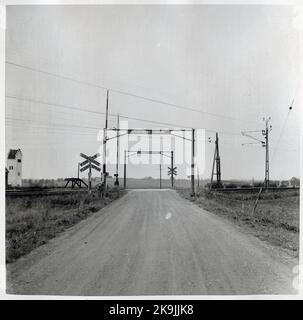 Railway crossing at Jordholmen N: A, seen from the track Stock Photo ...