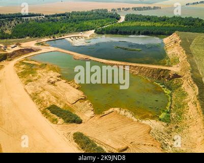 Process of construction sand mining from open huge quarry Stock Photo ...