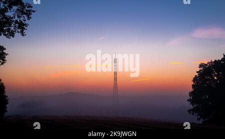relay Cell tower in the early morning against the background of an ...