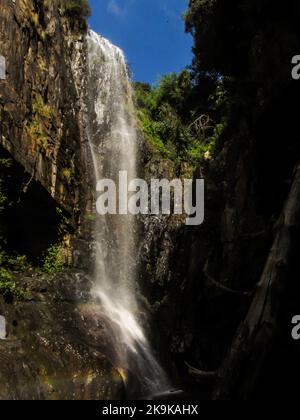 The Battery creek waterfall in a narrow secluded ravine, in the ...