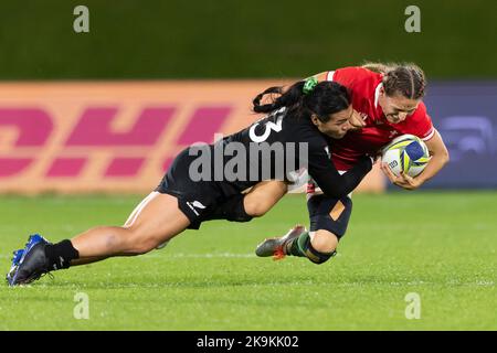 Wales' Jasmine Joyce (right) is tackled by New Zealand's Stacey Fluhler ...