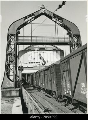Loading of freight wagon on the ferry in Trelleborg's ferry location ...