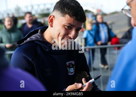 Coventry City's Gustavo Hamer signs autographs as he arrives at the ...