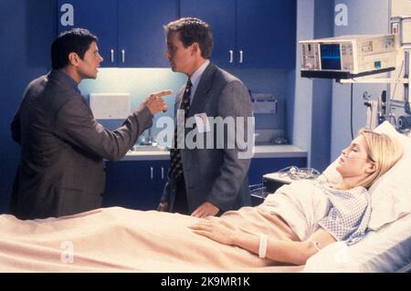 KELLY RUTHERFORD and THOMAS CALABRO in MELROSE PLACE (1992), directed by ANSON WILLIAMS, RICHARD ...