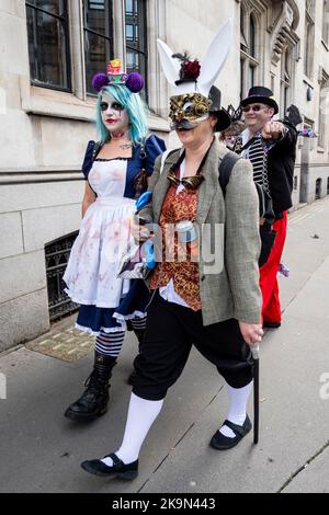 London UK. 29 October 2022. A couple relaxing in deckchairs in the ...