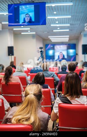 Online conference in narrow room Stock Photo - Alamy