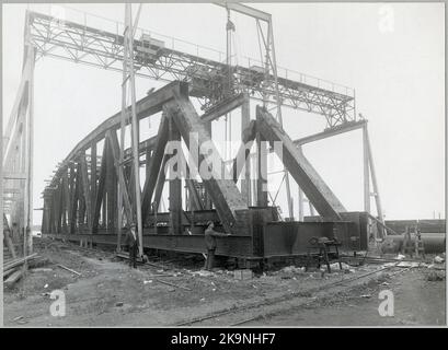Construction of railway bridge over the Vindel River, on the line ...