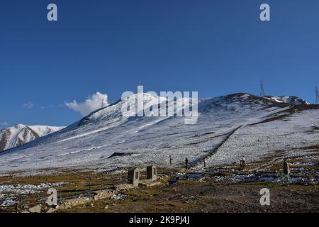 Visitors explore the snow covered Pir Panjal Pass, also called Peer Ki ...