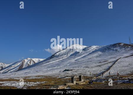 Visitors explore the snow covered Pir Panjal Pass, also called Peer Ki ...