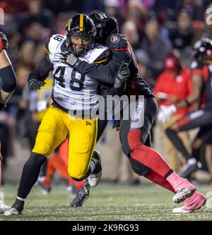 Hamilton Tiger-Cats Cedric Wilcots II (48) hits Ottawa Redblacks ...