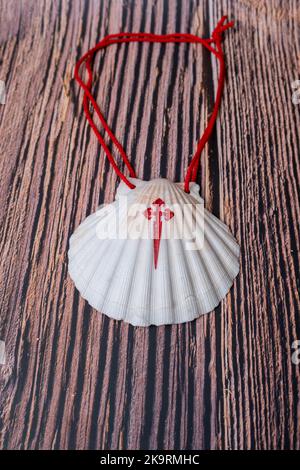 Pilgrim Scallop shells with the Cross of the Order of Santiago. Typical ...