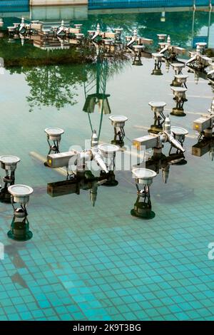 pipe system and lights in an empty fountain Stock Photo - Alamy