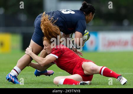 Canada's Alex Tessier tackles USA's Eti Haungatau during the Women's ...