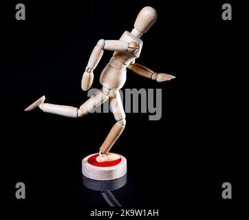 Image of falling wooden manikin on black background, wooden manikin ...