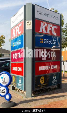Notice board sign of brands at Reading West motorway service station ...