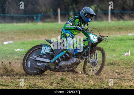 Harrison Rogers racing in a grasstrack motorcycle race. Donut Meeting ...