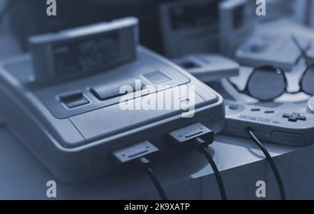 Old popular game console with joysticks Stock Photo - Alamy