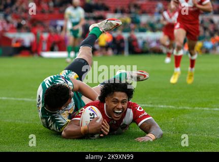 Tonga's Tesi Niu goes over the line to score a try during the Rugby ...