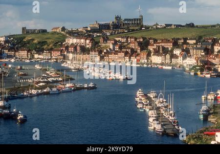 1980s archive photograph of the River Esk and Whitby Abbey Stock Photo ...