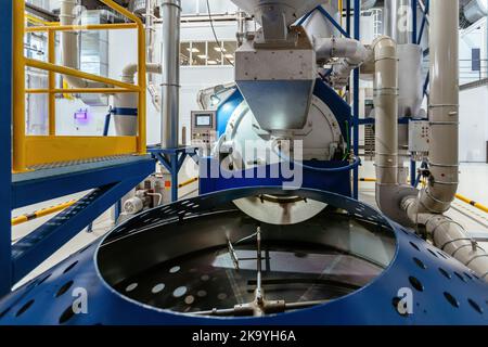 Large modern industrial automated coffee roaster Stock Photo - Alamy