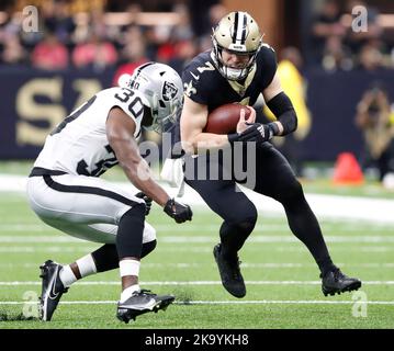 Las Vegas Raiders tight end Carter Runyon runs the ball against the ...