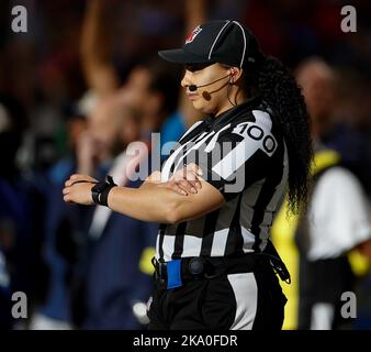 Line judge Maia Chaka (100) works an NFL football game between the ...